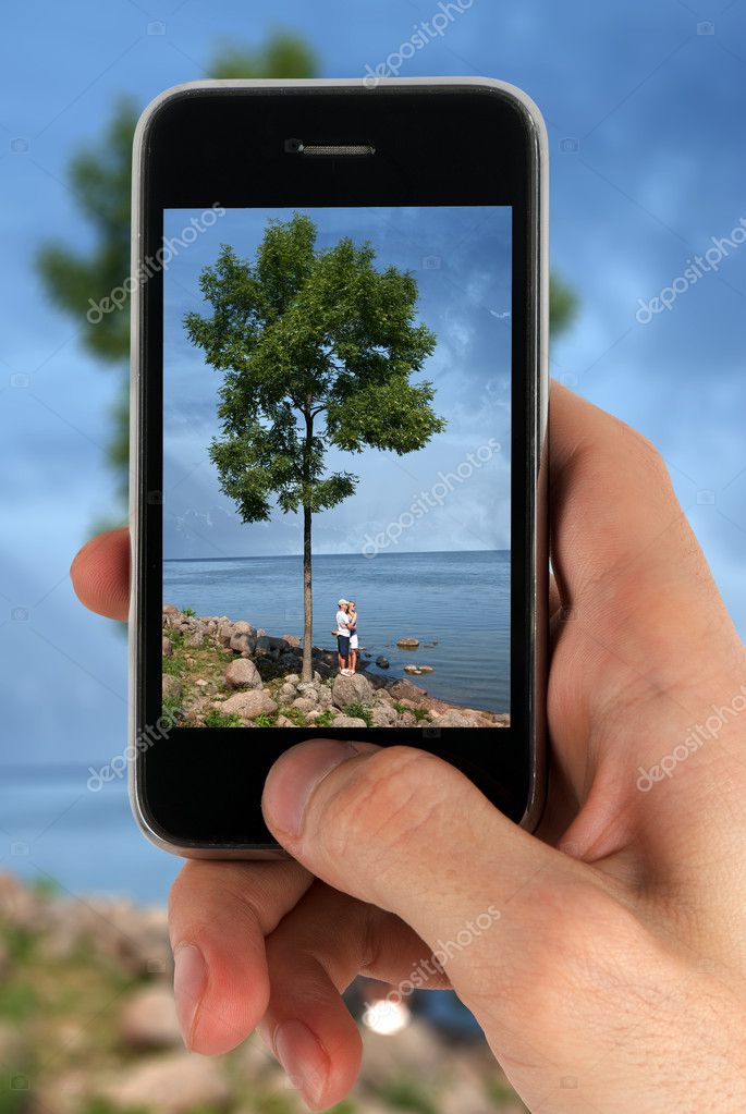 Taking picture from camera cell phone — Stock Photo © spaxiax #7286131