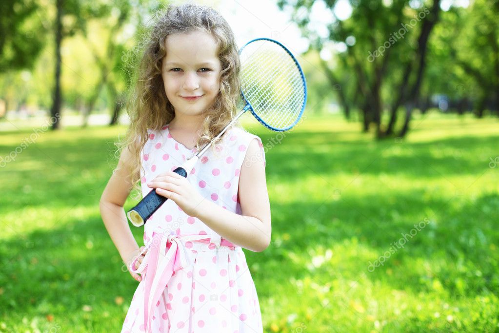 Little girl in summer park Stock Photo by ©SergeyNivens 7537839