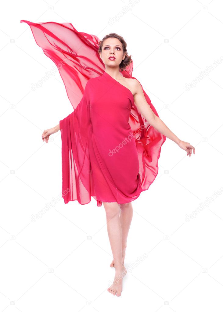 Beautiful woman in red flying dress Stock Photo by ©zastavkin 7957116