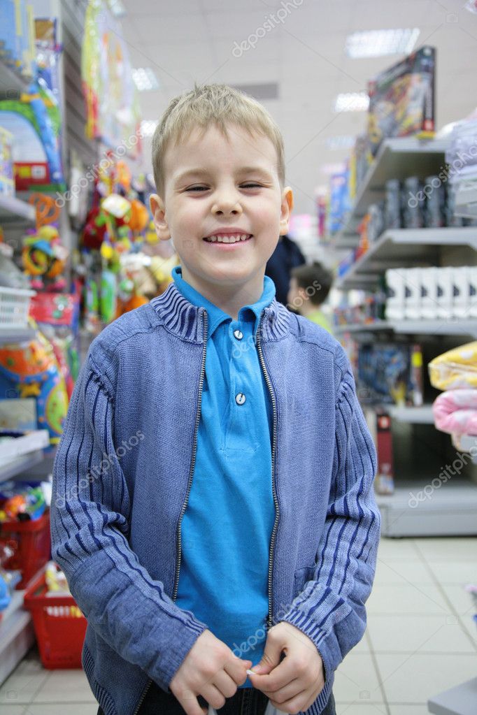 Boy in toy section in shop Stock Photo by ©Paha_L 7443292