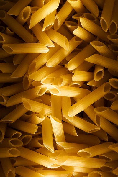 Italian Smooth Penne Lisce Macaroni Pasta raw food background or Stock ...