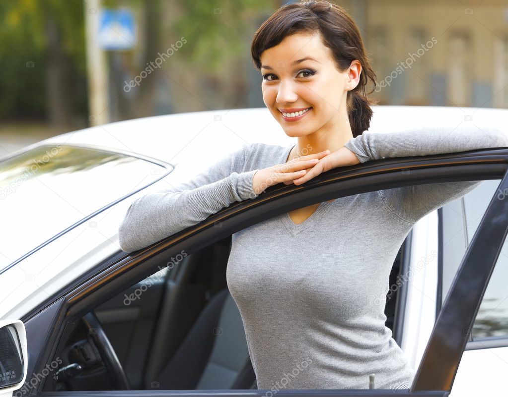 Pretty girl and white car — Stock Photo © Nobilior #6990406