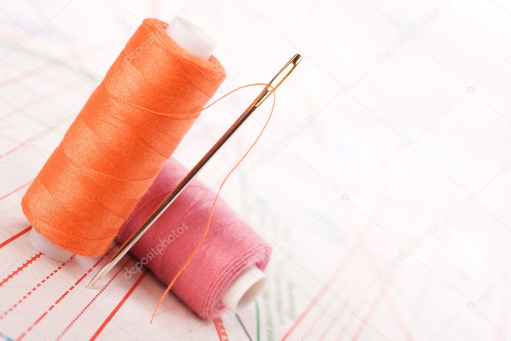 Spool of thread and needle. Sew accessories. — Stock Photo © natika ...