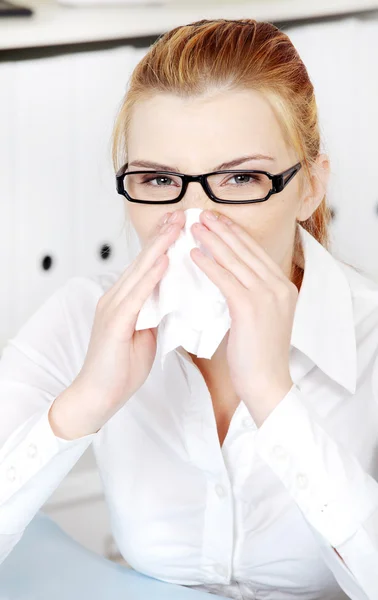 Sneezing woman`s closeup. - Stock Image - Everypixel