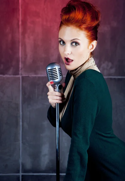 Female singer red dress — Stock Photo © aleynikov #7776736