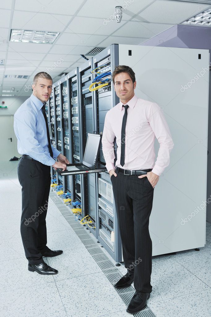 It engineers in network server room — Stock Photo © .shock #7333046