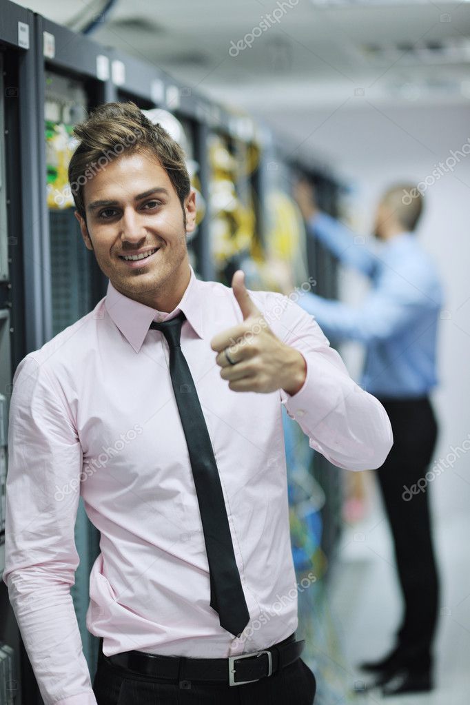 It engineers in network server room — Stock Photo © .shock #7339785