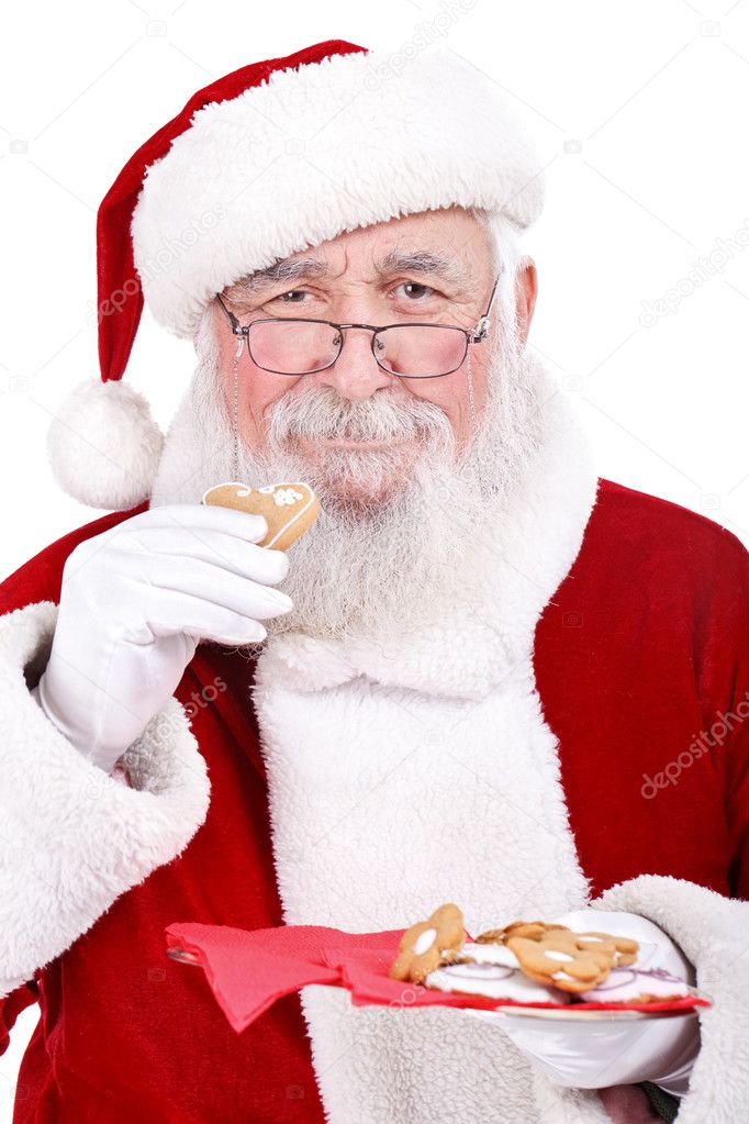 Santa eating cookie — Stock Photo © luckybusiness #7933467