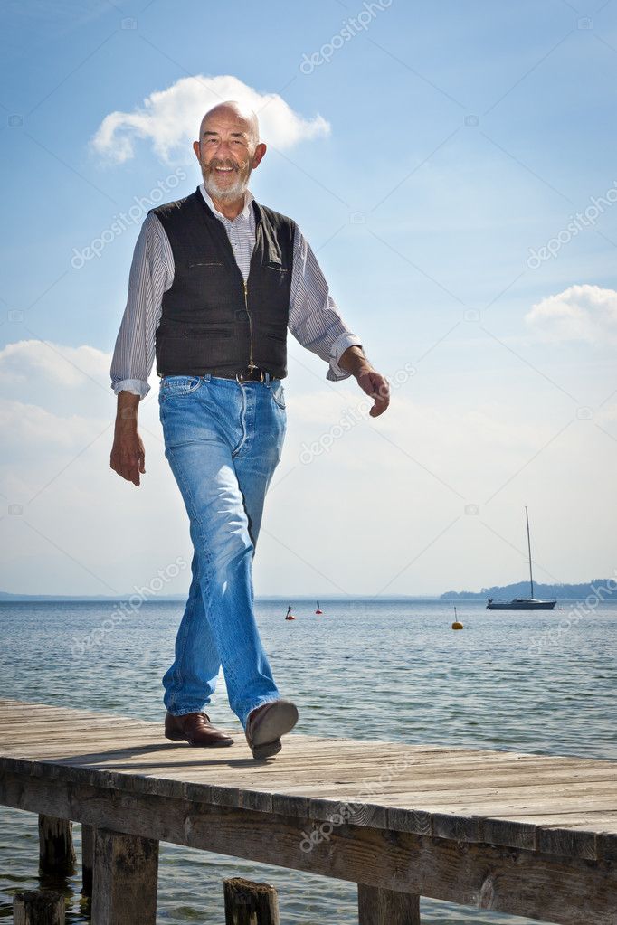 Old man walking — Stock Photo © magann #6836047