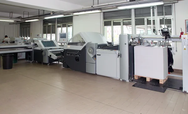 Print shop (press printing) - Finishing line Stock Photo by ©moreno ...