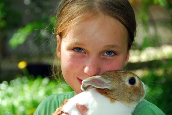 Girl hugging rabbit Stock Photos, Royalty Free Girl hugging rabbit ...