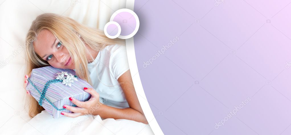 Bedroom surprise present - young happy woman in bedroom — Stock Photo ...