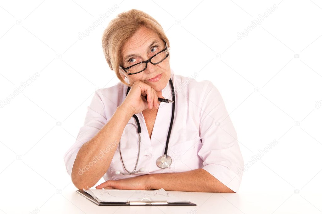 Doctor at table Stock Photo by ©aletia 7379412
