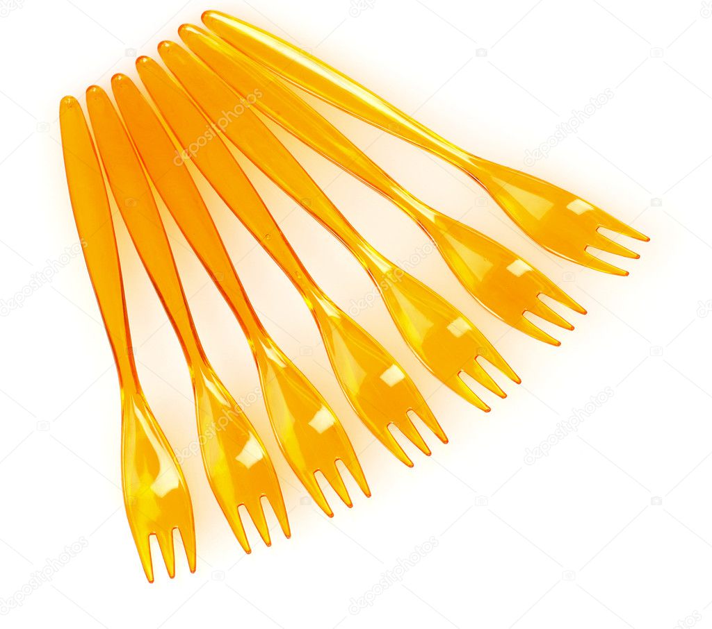 Yellow plastic forks — Stock Photo © belchonock #6793801