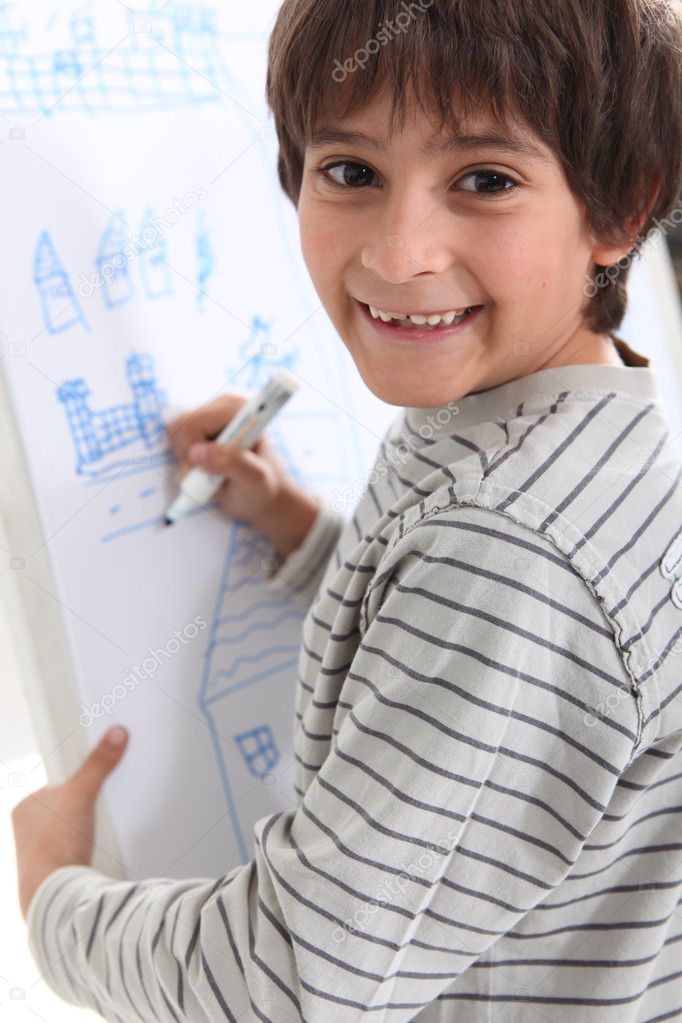 Child drawing on a whiteboard Stock Photo by ©photography33 7931779