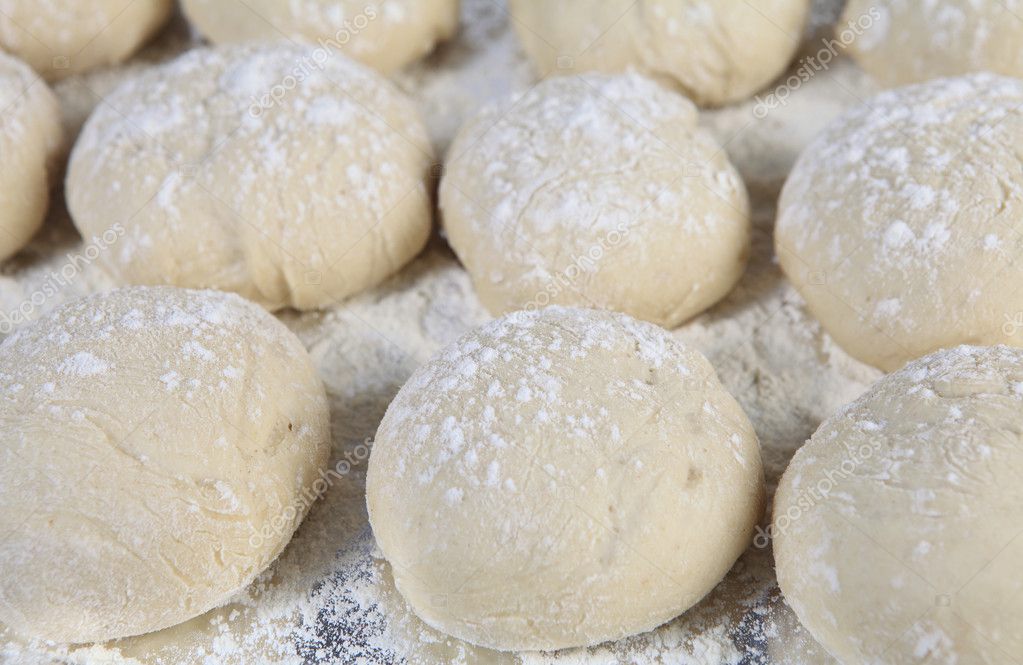Uncooked bread rolls — Stock Photo © Paul_Cowan #7036675