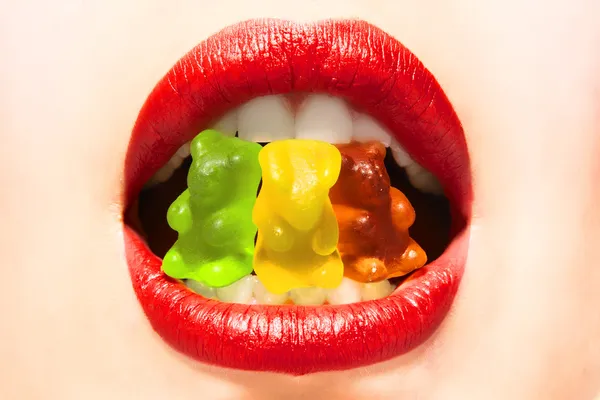 Candy in the mouth — Stock Photo © gzorgz #5300600
