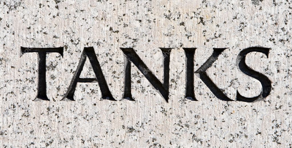 Word "Tanks" Carved in Gray Granite Stone — Stock Photo © Qingwa #7895307